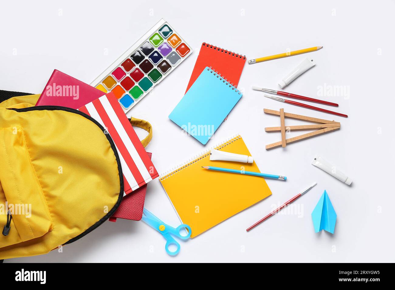 Composition with stylish school backpack and different stationery ...