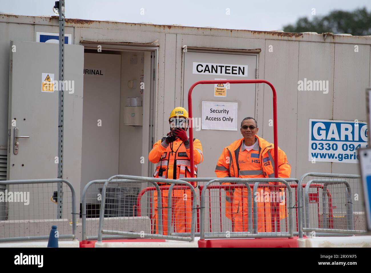Harefield, UK. 27th September, 2023. An HS2 Security Guard photographs ...