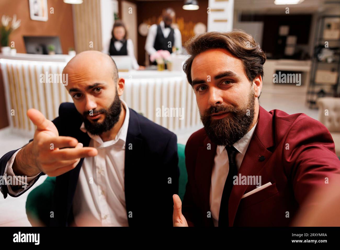 POV of diverse men in hotel lobby, meeting abroad to create new ...