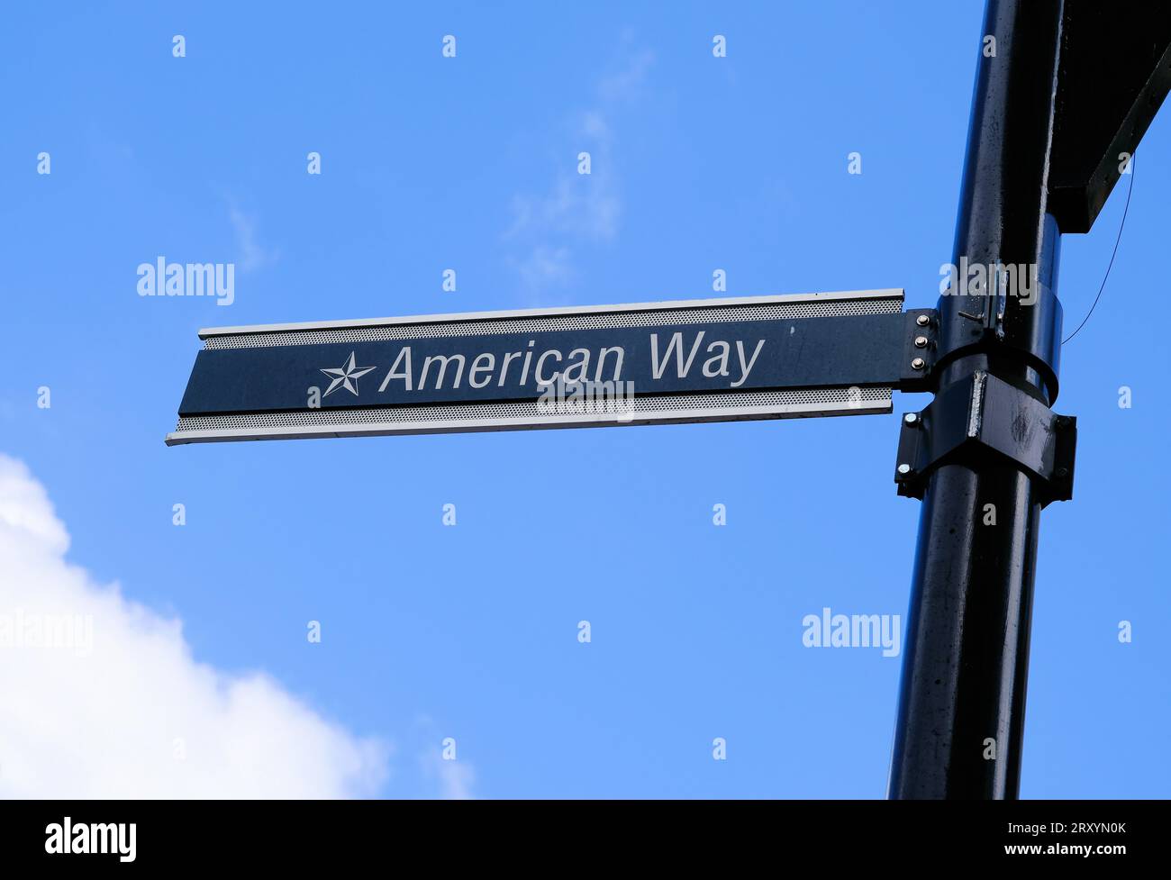 "American Way" street sign against a blue sky with white clouds Stock ...