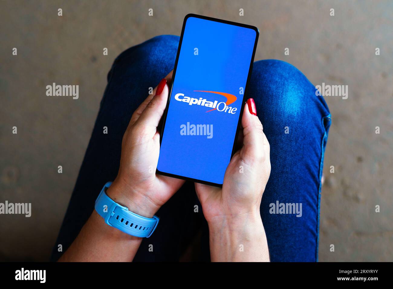 In this photo illustration, the Capital One logo is displayed on a ...