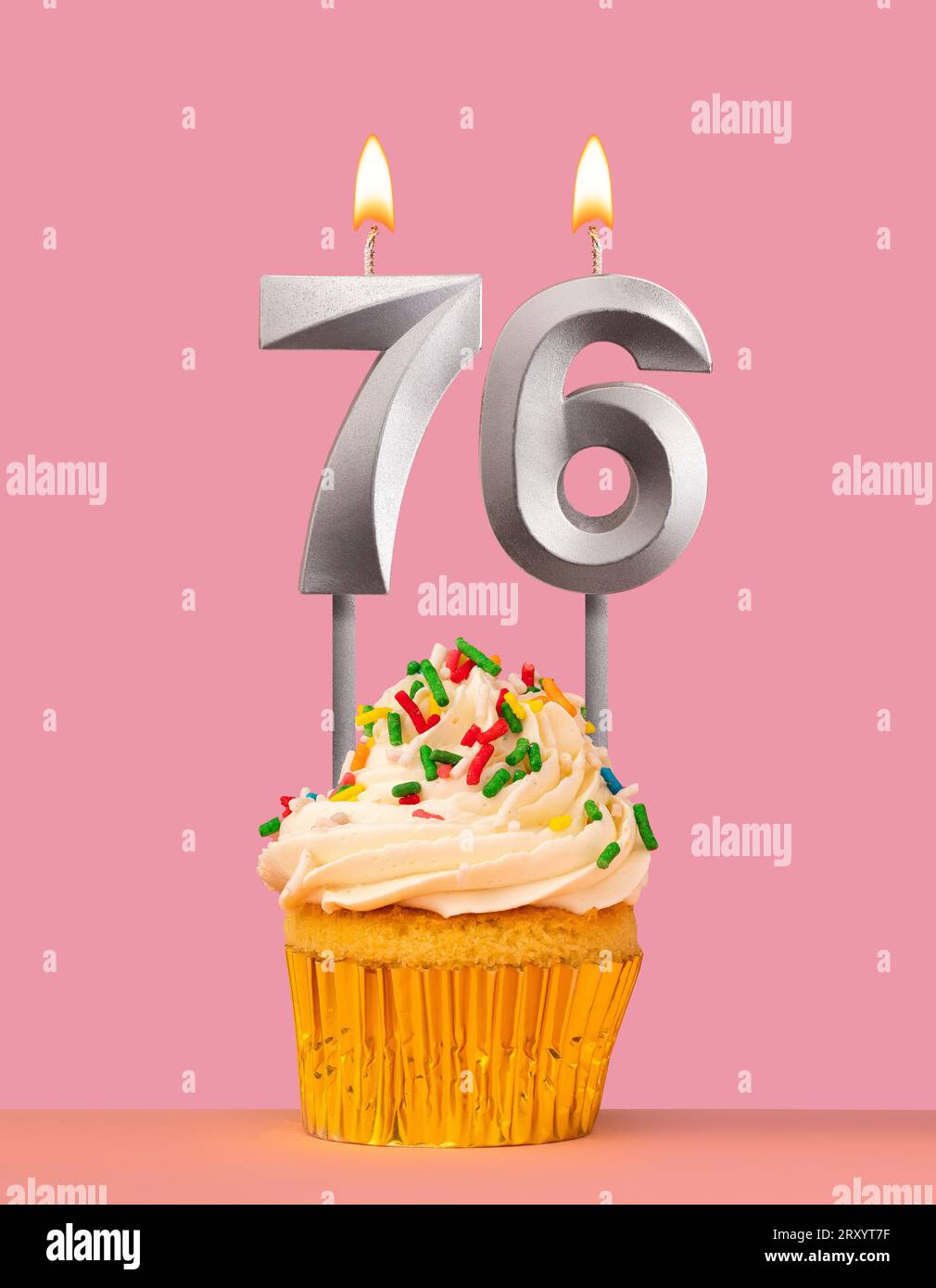 Number 76 candle with cupcake - Birthday card Stock Photo - Alamy