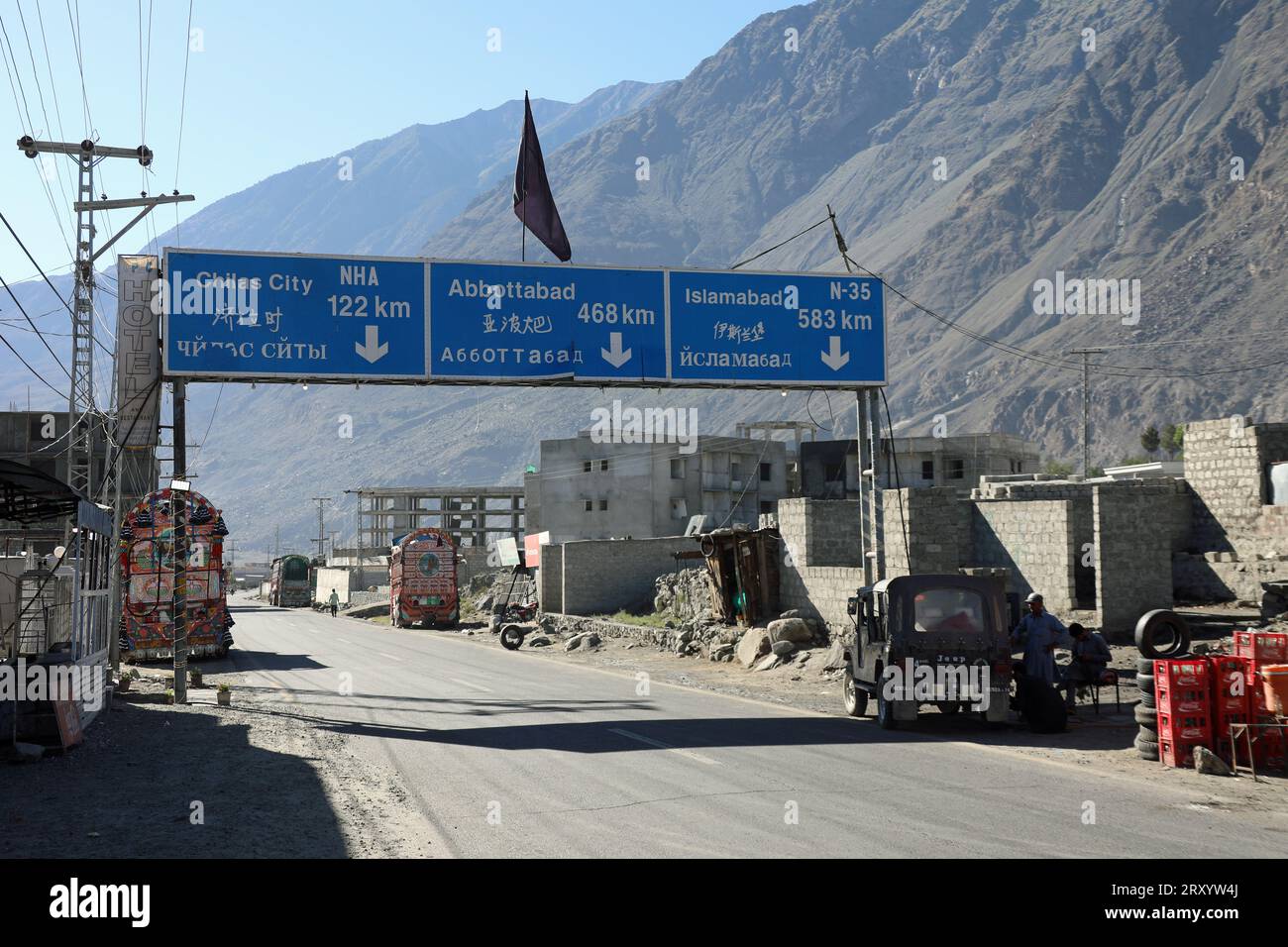 Road sign on the Karakoram Highway at Gilgit Baltistan in northern ...