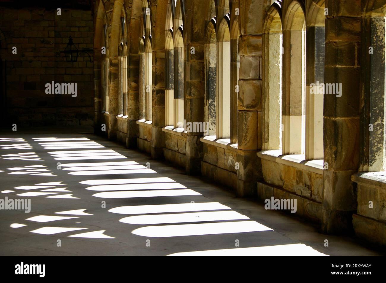 Shadows of arched windows in the cloisters at Durham Cathedral. Durham ...