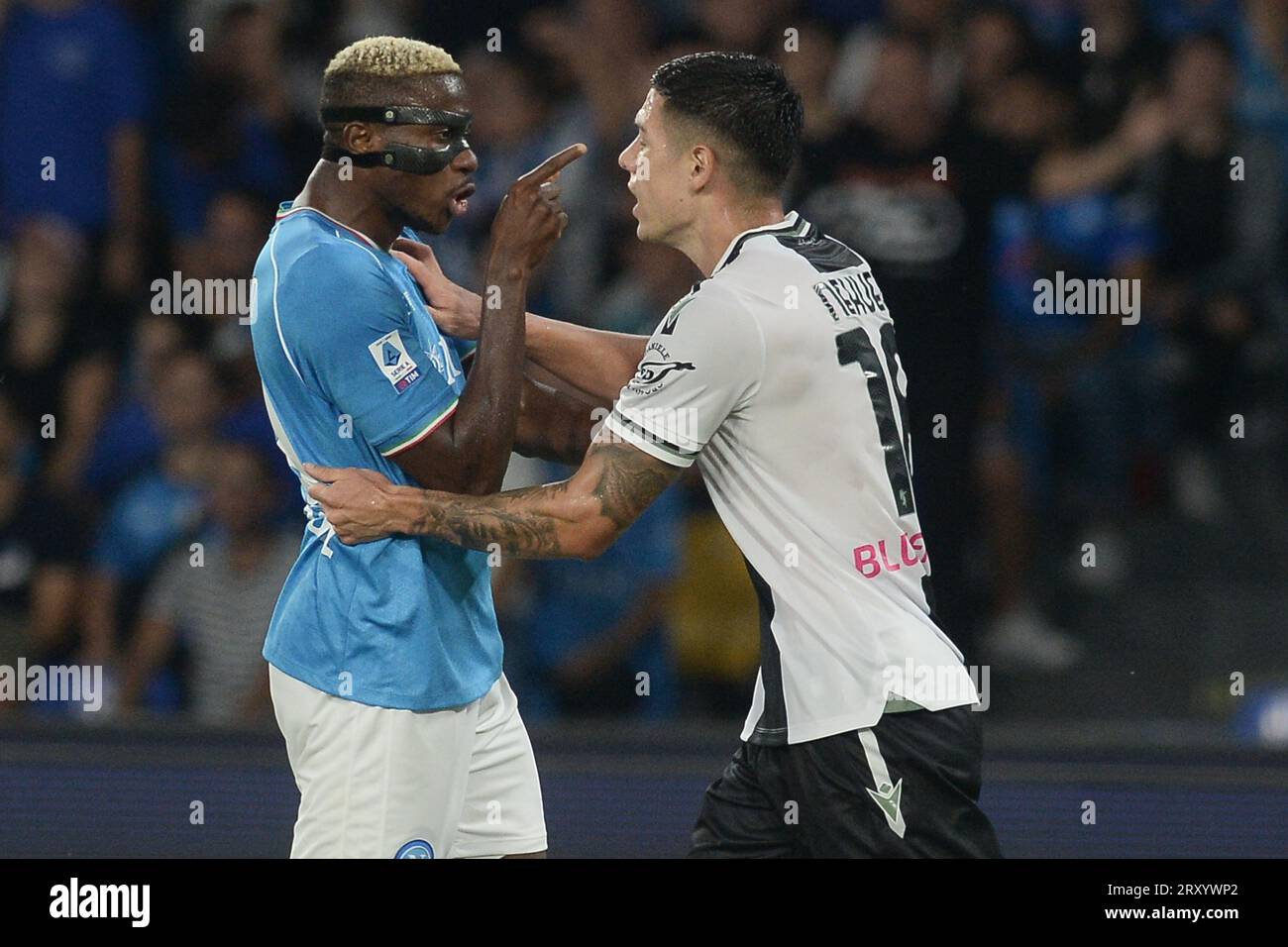 Victor Osimen of SSC Napoli reacts against Nehuen Perez of Udinese ...