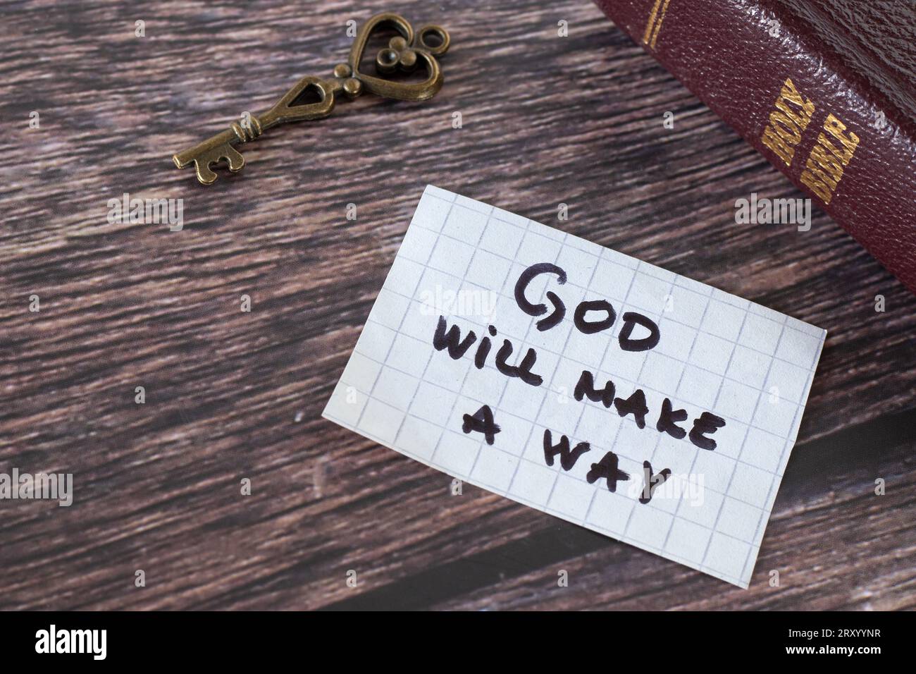 God will make a way, handwritten quote and ancient key and holy bible ...