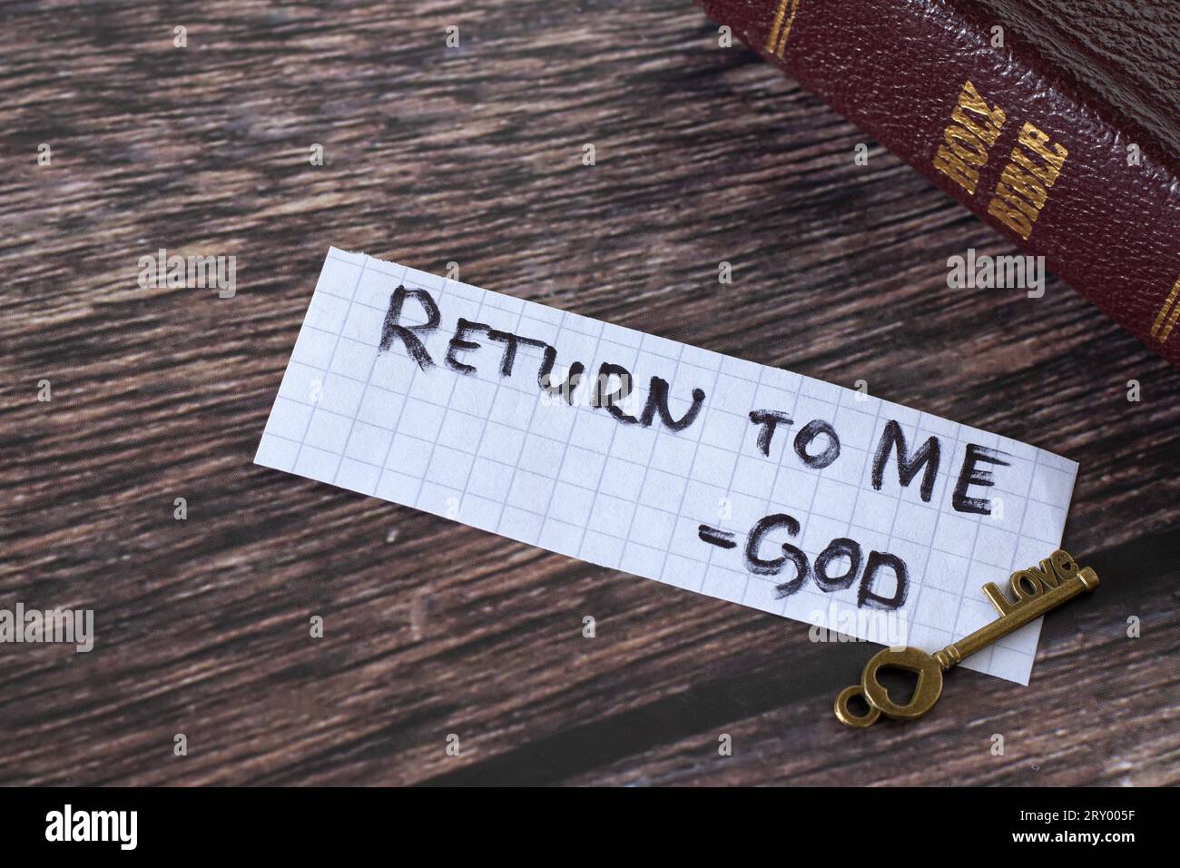 Return to Me, God, handwritten quote with holy bible and ancient key ...