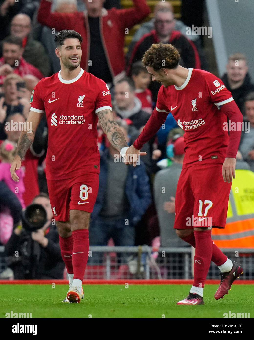 Dominik Szoboszlai #8 of Liverpool celebrates with Curtis Jones #17 of ...