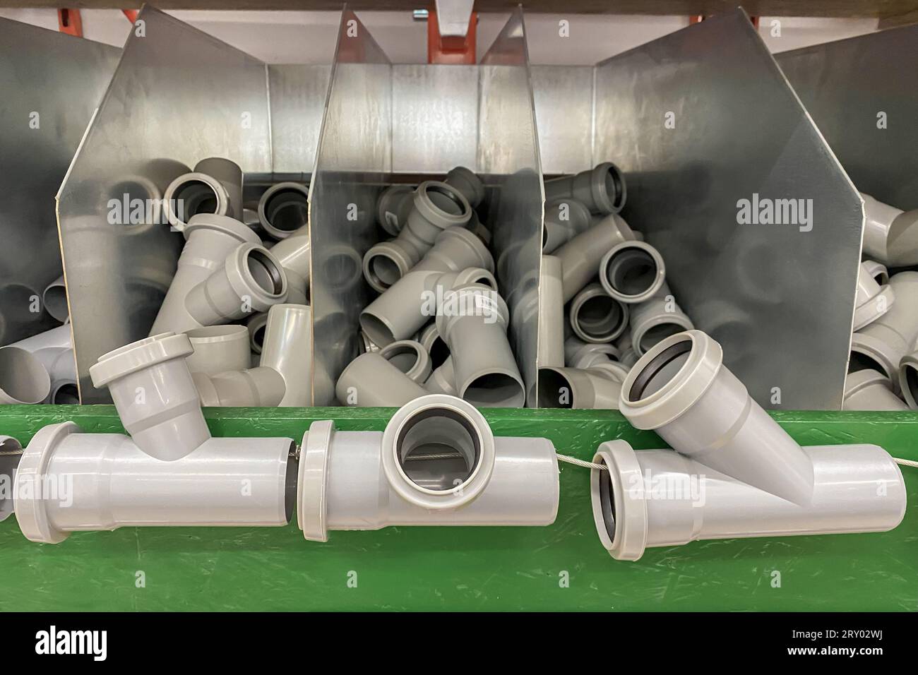 Gray pvc plumbing pipes corners. Warehouse of polypropylene pipes. line ...