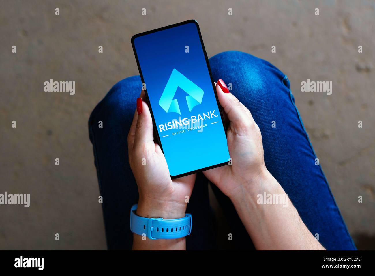 In this photo illustration, the Rising Bank logo is displayed on a ...