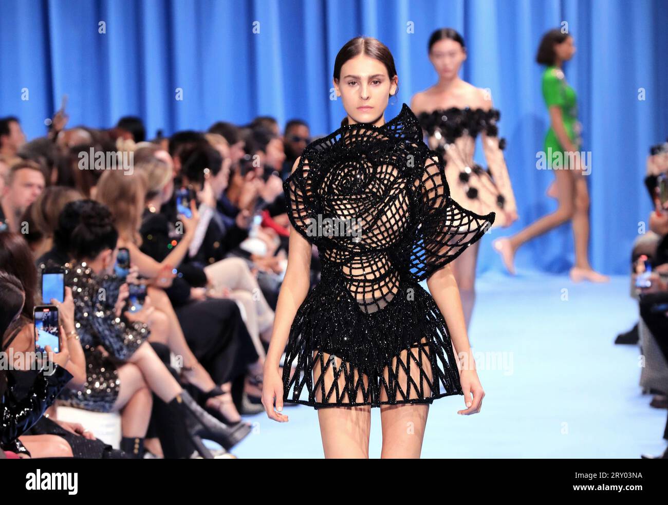 A model takes to the catwalk during Balmain's show as part of the ...