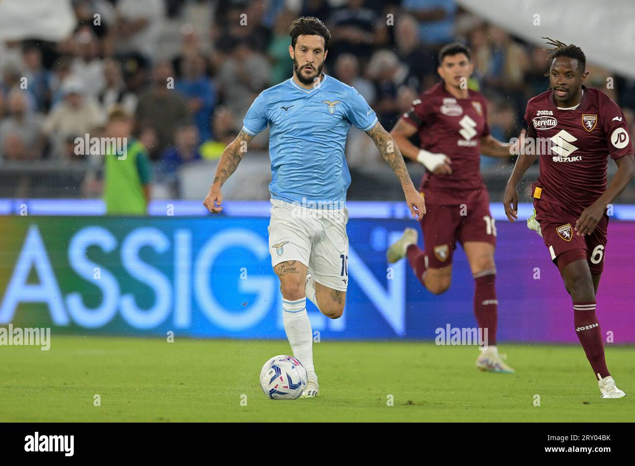 Luis Alberto of SS Lazio and Adrien Tameze of Torino FC during football ...