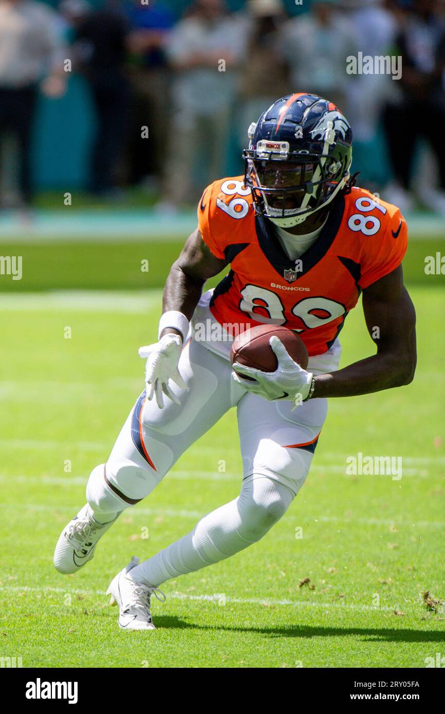 Denver Broncos wide receiver Brandon Johnson (89) runs with the ball ...