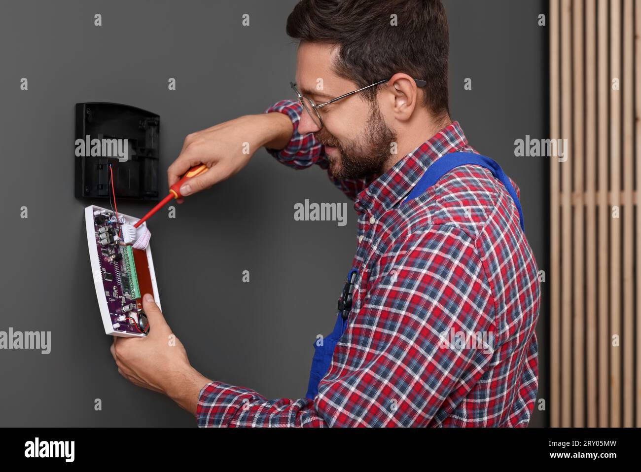 Installing business security system hi-res stock photography and images ...