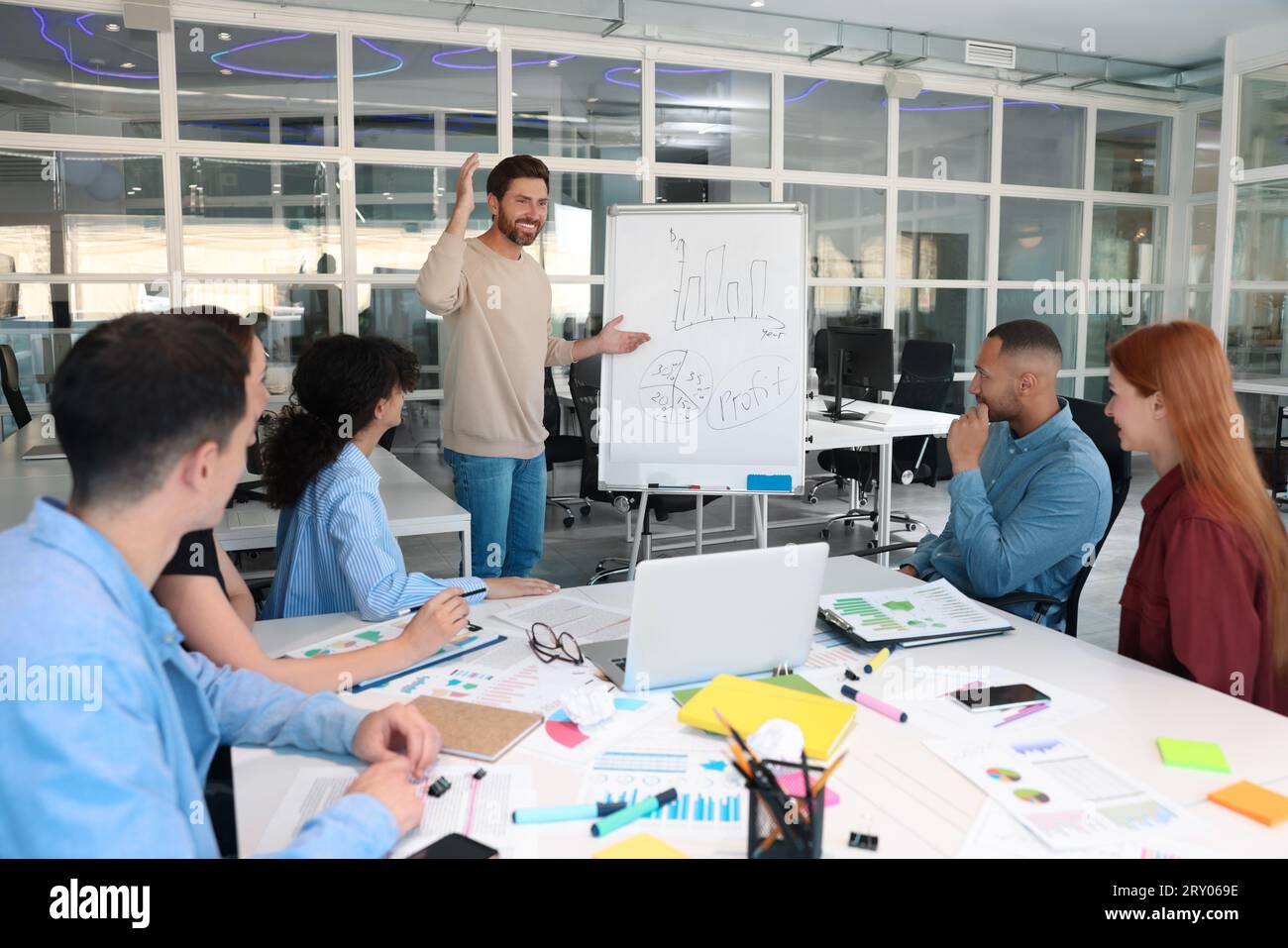 Team of employees having meeting in office. Startup project Stock Photo ...