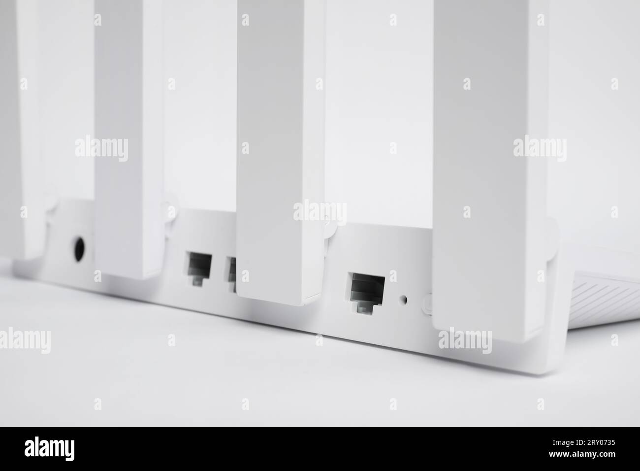 One modern Wi-Fi router on white background, closeup Stock Photo - Alamy