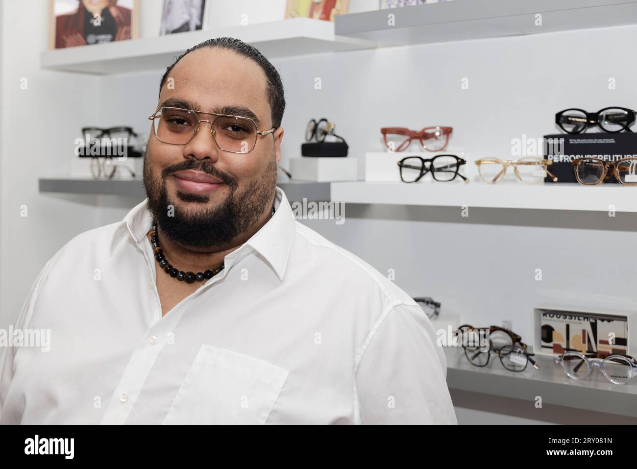 Paris, France. 27th Sep, 2023. Model Jeremy Bellet is advised on his ...