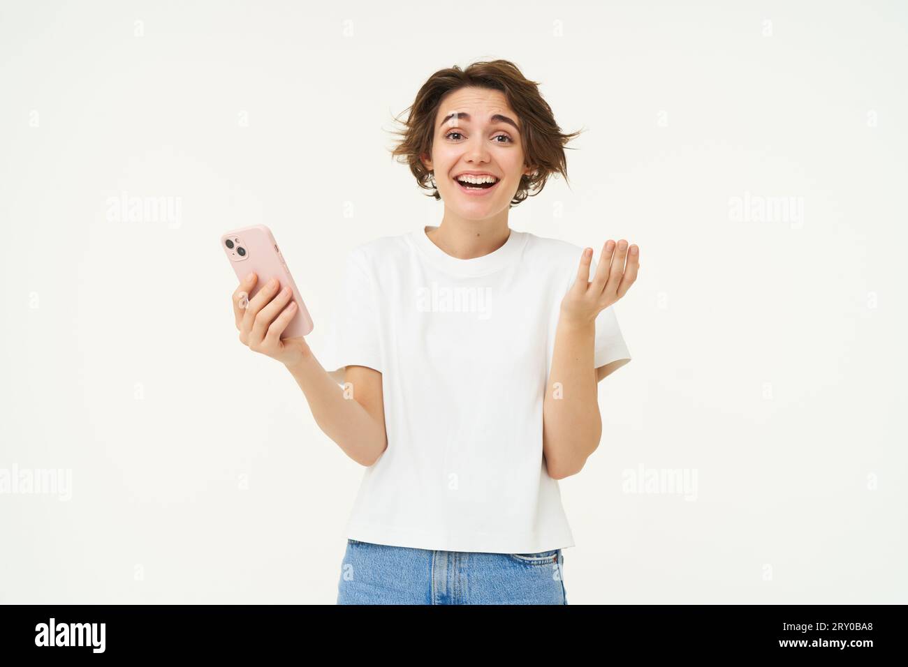 Technology and people. Happy brunette woman with mobile phone, smiling ...