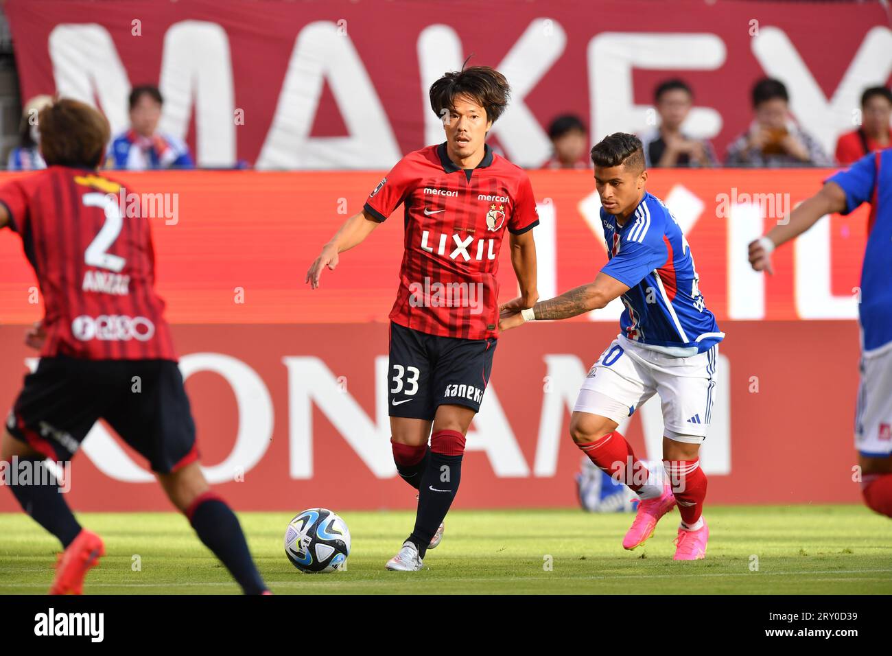 Kashima Antlers' Hayato Nakama, left, and Yokohama FMarinos' Yan ...