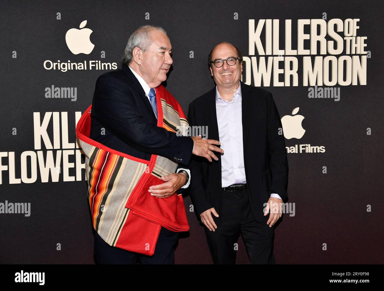 Principal Chief of the Osage Nation Geoffrey Standing Bear, left, and ...