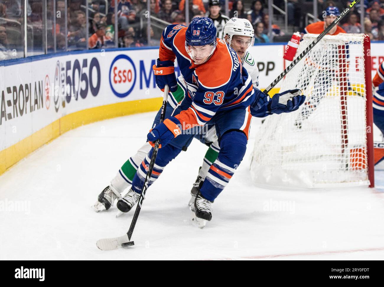 Vancouver Canucks' Teddy Blueger (53) chases Edmonton Oilers' Ryan ...