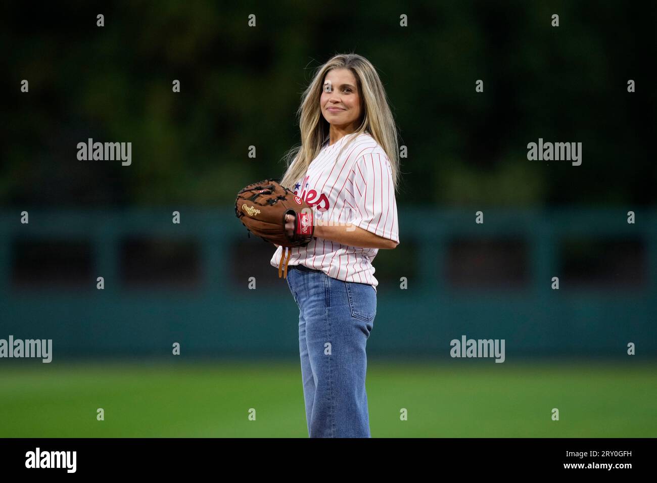 Actress Danielle Fishel throws out a pitch before a baseball game ...