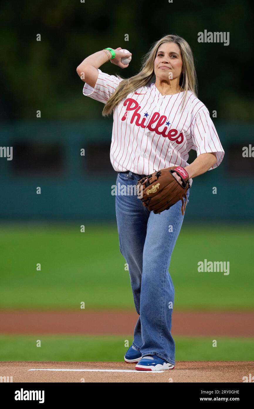 Actress Danielle Fishel throws out a pitch before a baseball game ...