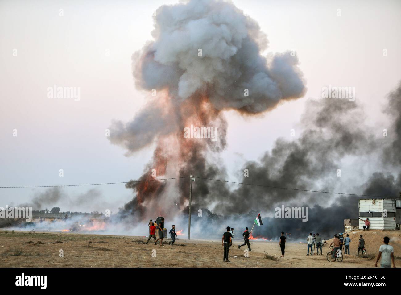 Palestinian protesters use improvised explosive devices during the ...