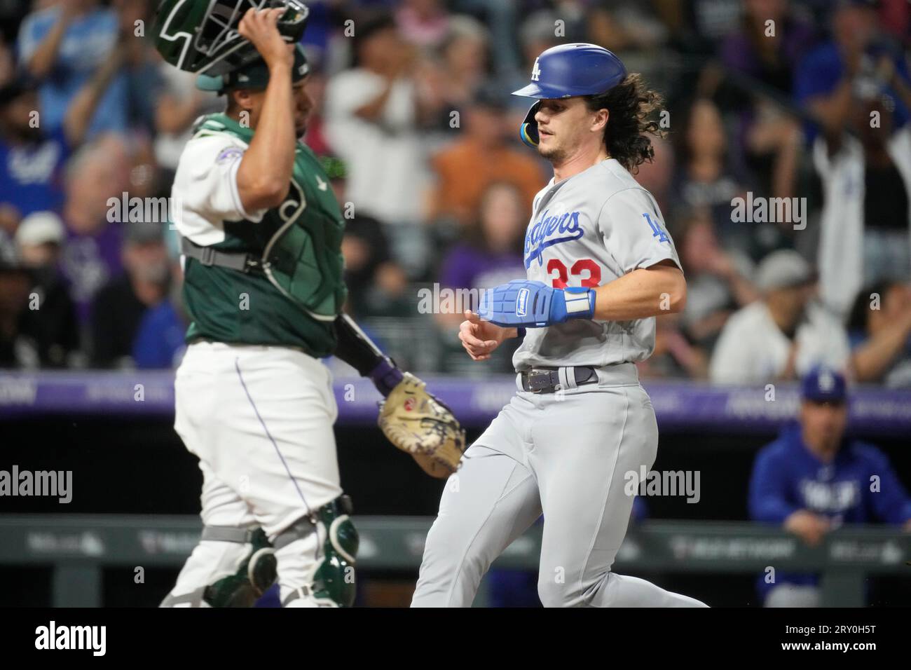 Los Angeles Dodgers' James Outman, right, scores on a double hit by ...