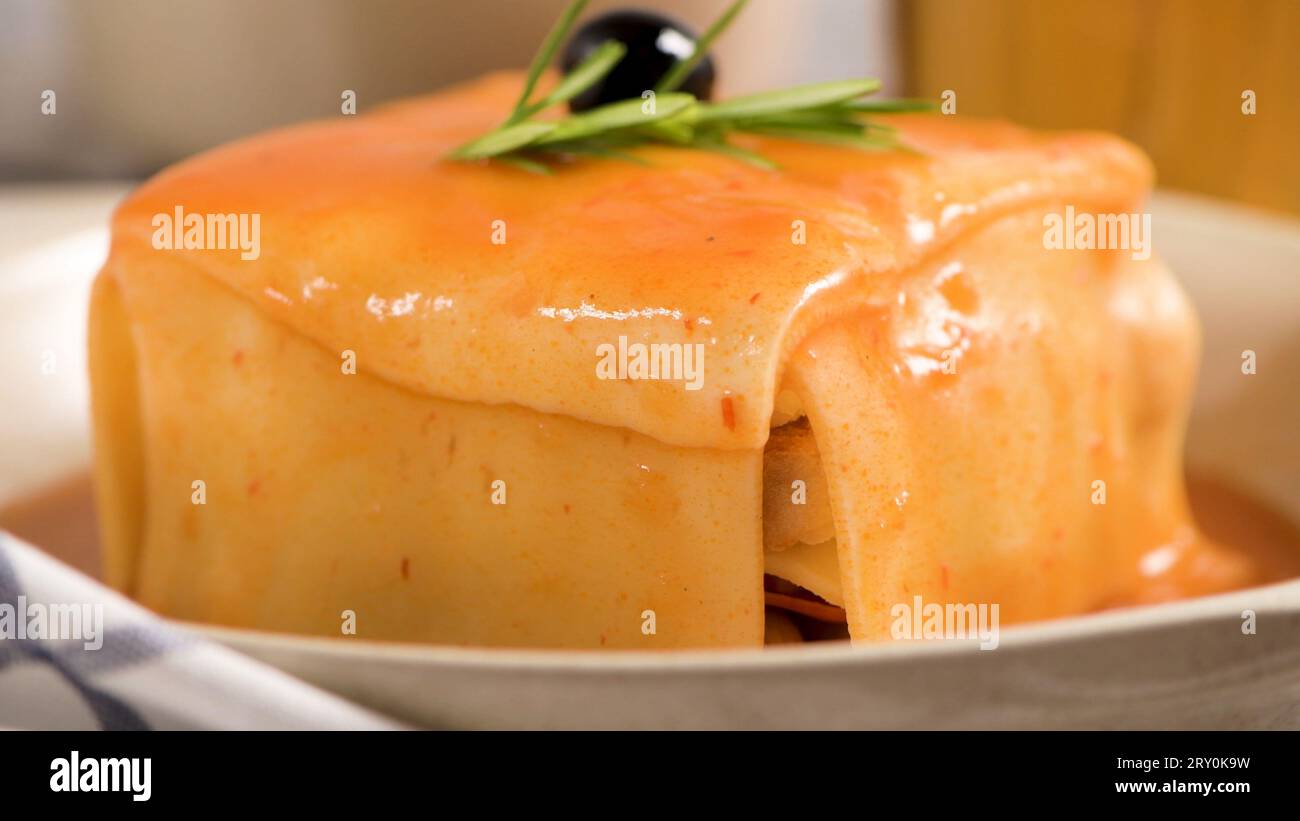 Traditional Portuguese snack food. Francesinha sandwich of bread ...