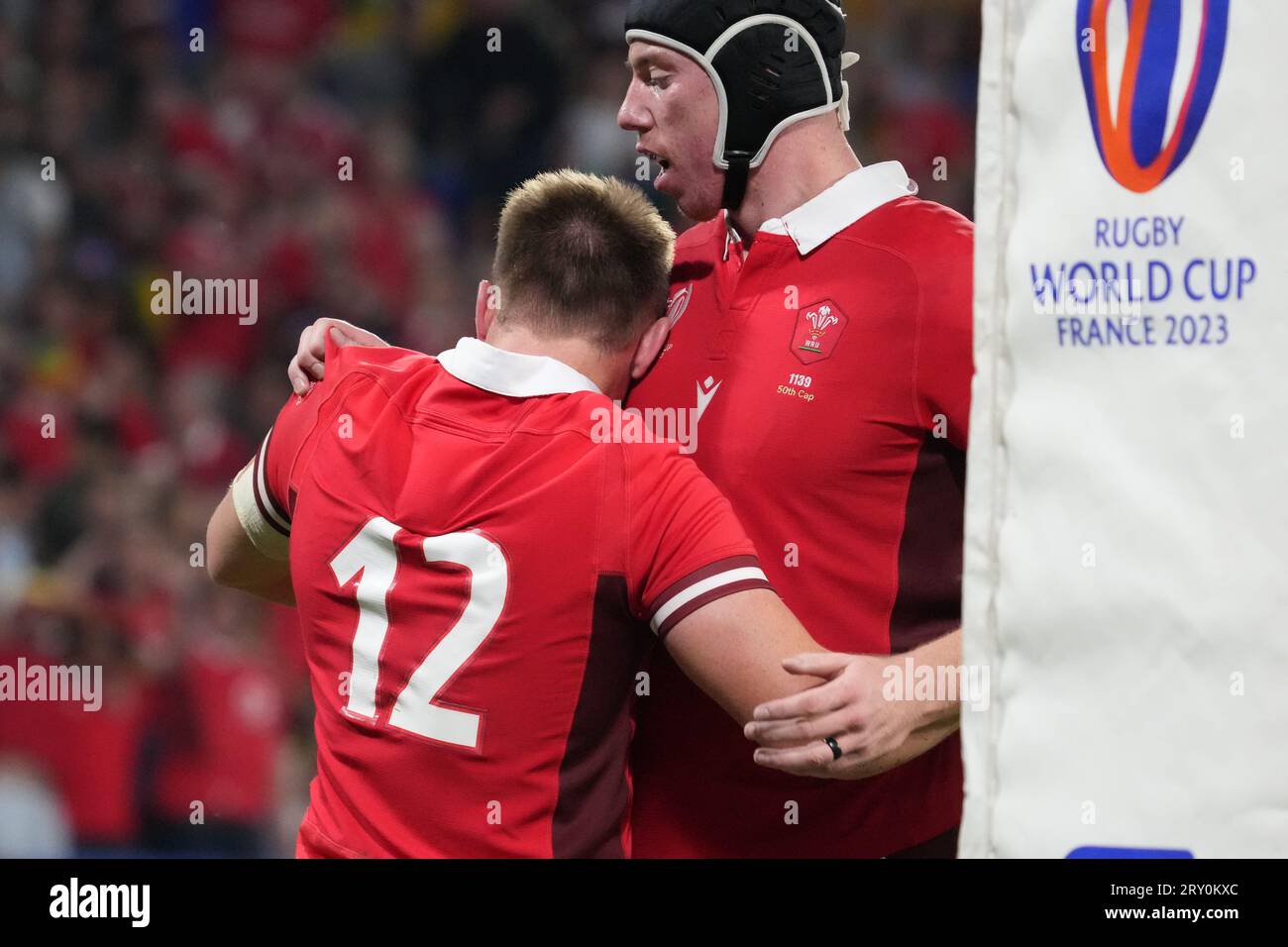 Wales' Nick Tompkins celebrates with Adam Beard after scoring a try ...