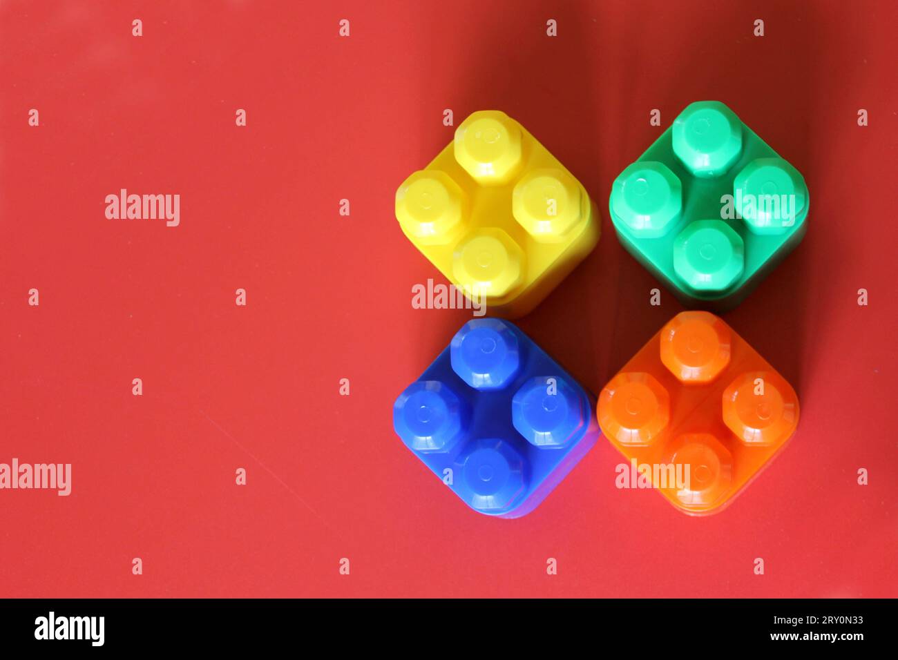 Pieces of plastic rainbow multicolored buildable toy blocks formed and ...