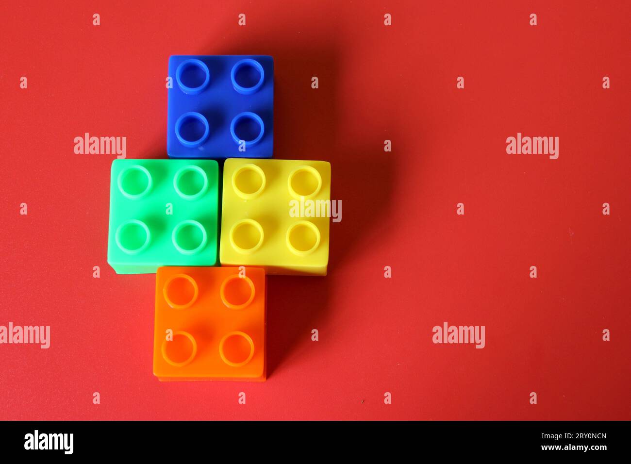 Pieces of plastic rainbow multicolored buildable toy blocks formed and ...