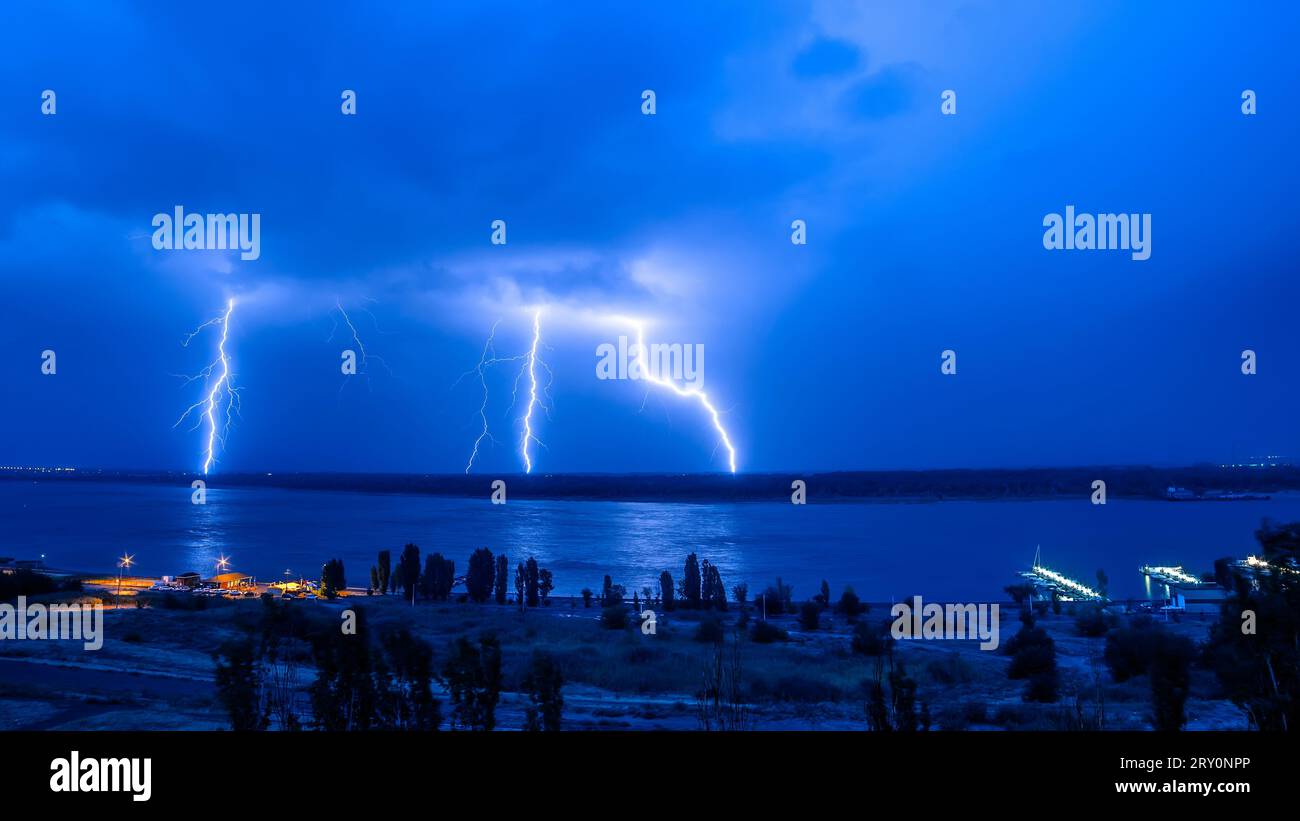 Night lightning over the river Stock Photo - Alamy