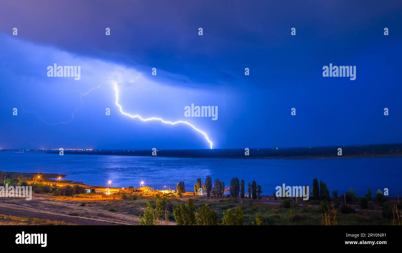 Night lightning over the river Stock Photo - Alamy