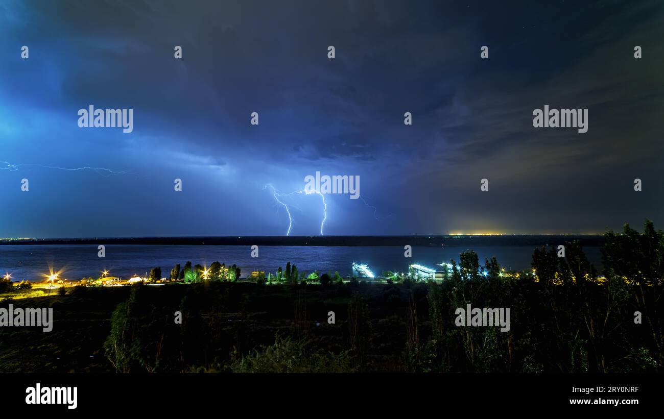 Night lightning over the river Stock Photo - Alamy