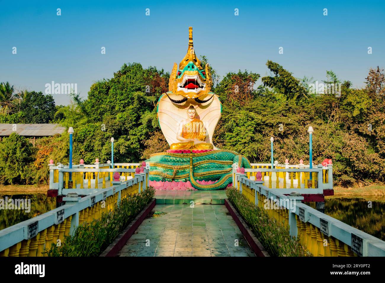 Buddha sits on the body of a giant cobra. Bago. Myanmar. (Burma Stock ...