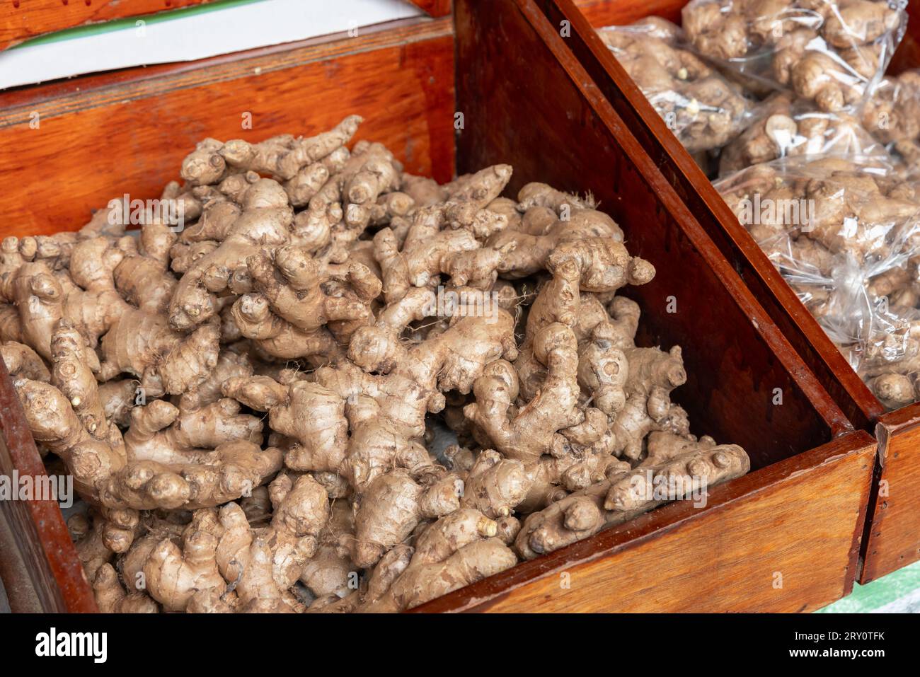 Heap of natural raw ginger is on a counter of local fruit market in ...