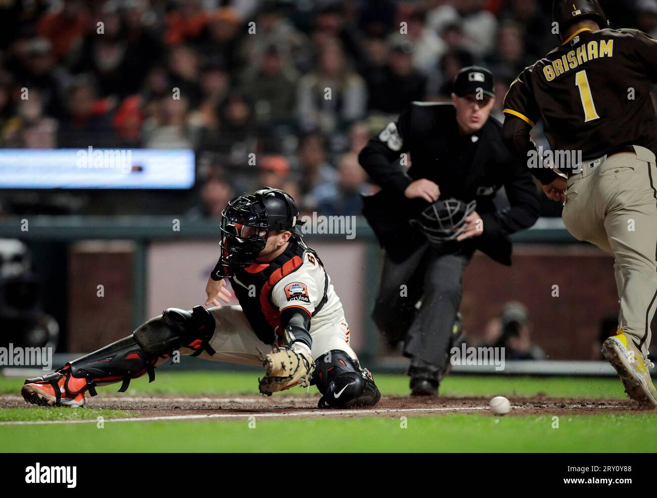 San Diego Padres' Trent Grisham scores the go-ahead run as San ...