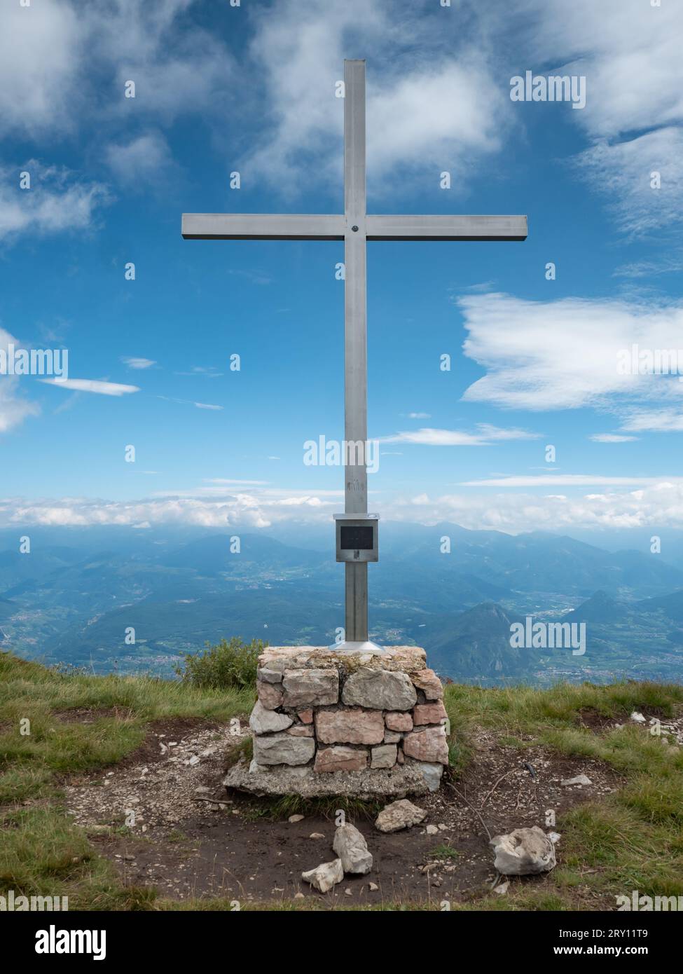 Iron cross at Canfedin mountain top in alp, Andalo and Molveno region ...