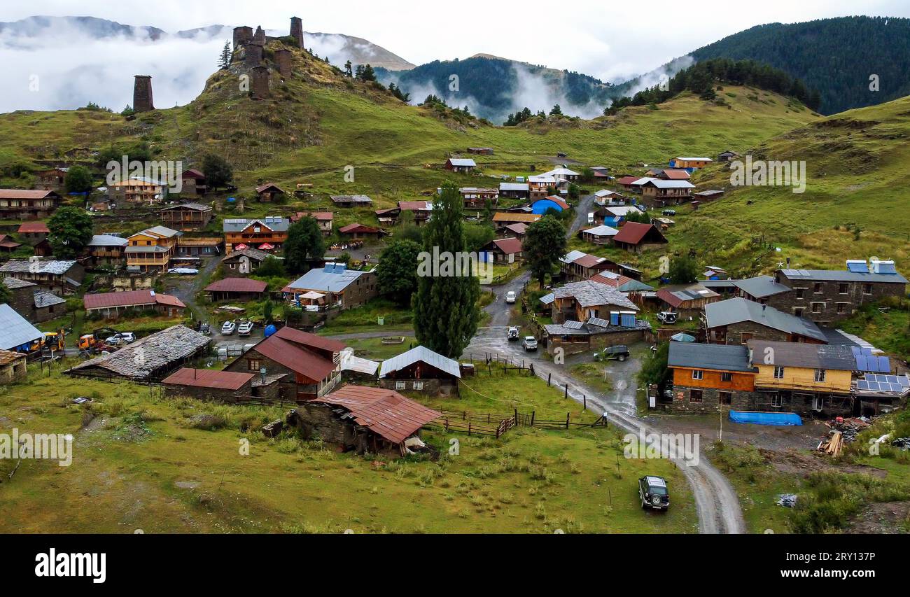 Aerial scenic view of old ruins of monastery above rural village Omalo ...