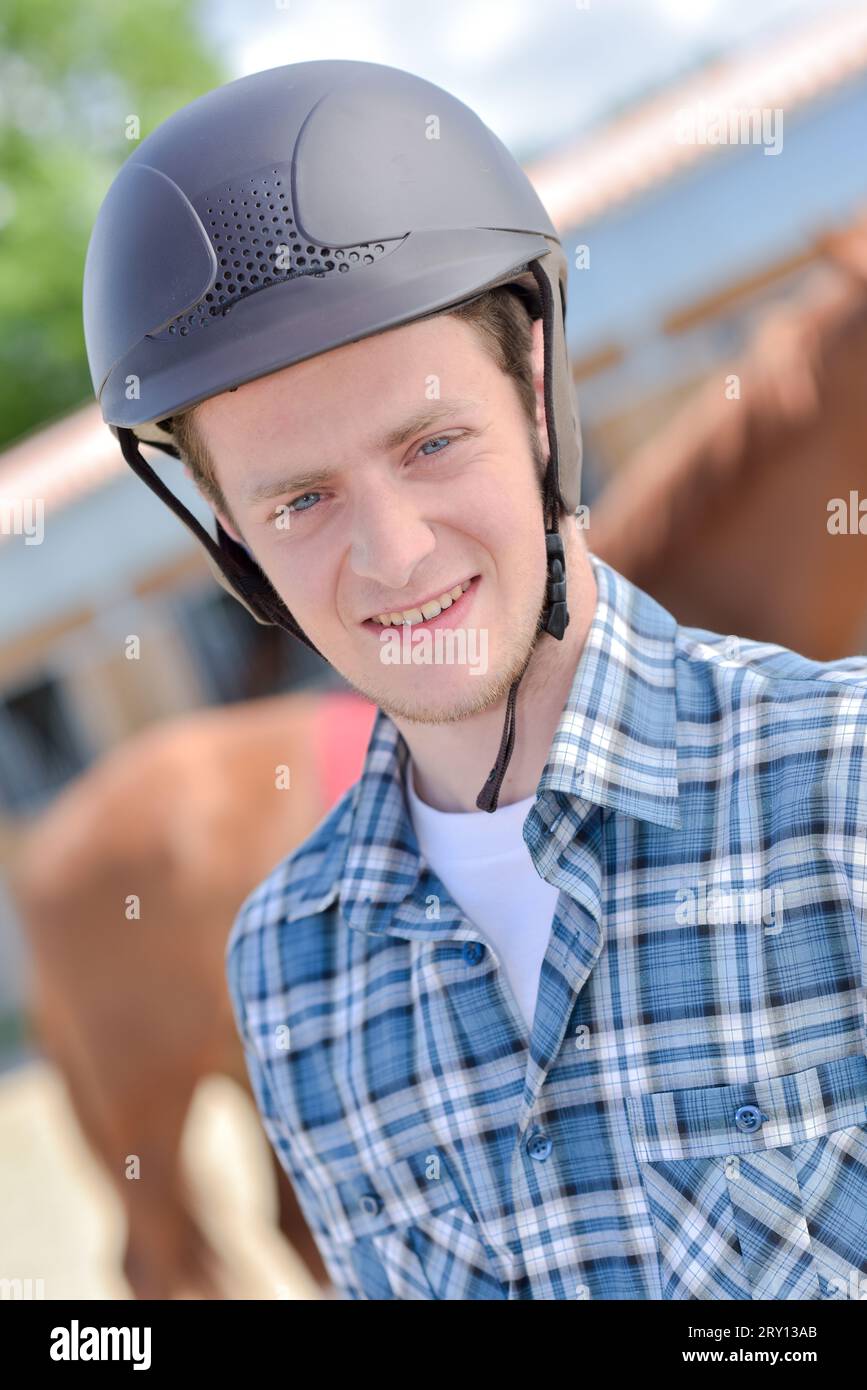 a male rider looking at camera Stock Photo - Alamy