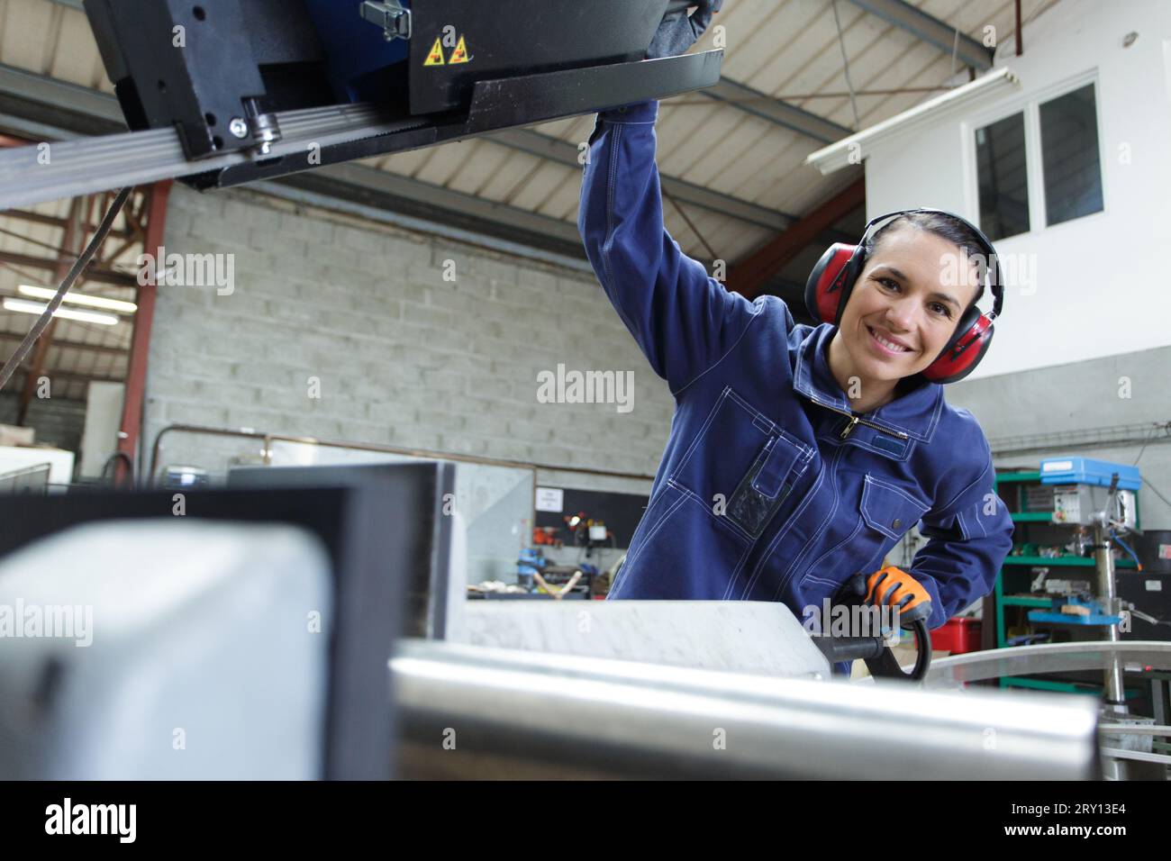 Female machinery operative hi-res stock photography and images - Alamy