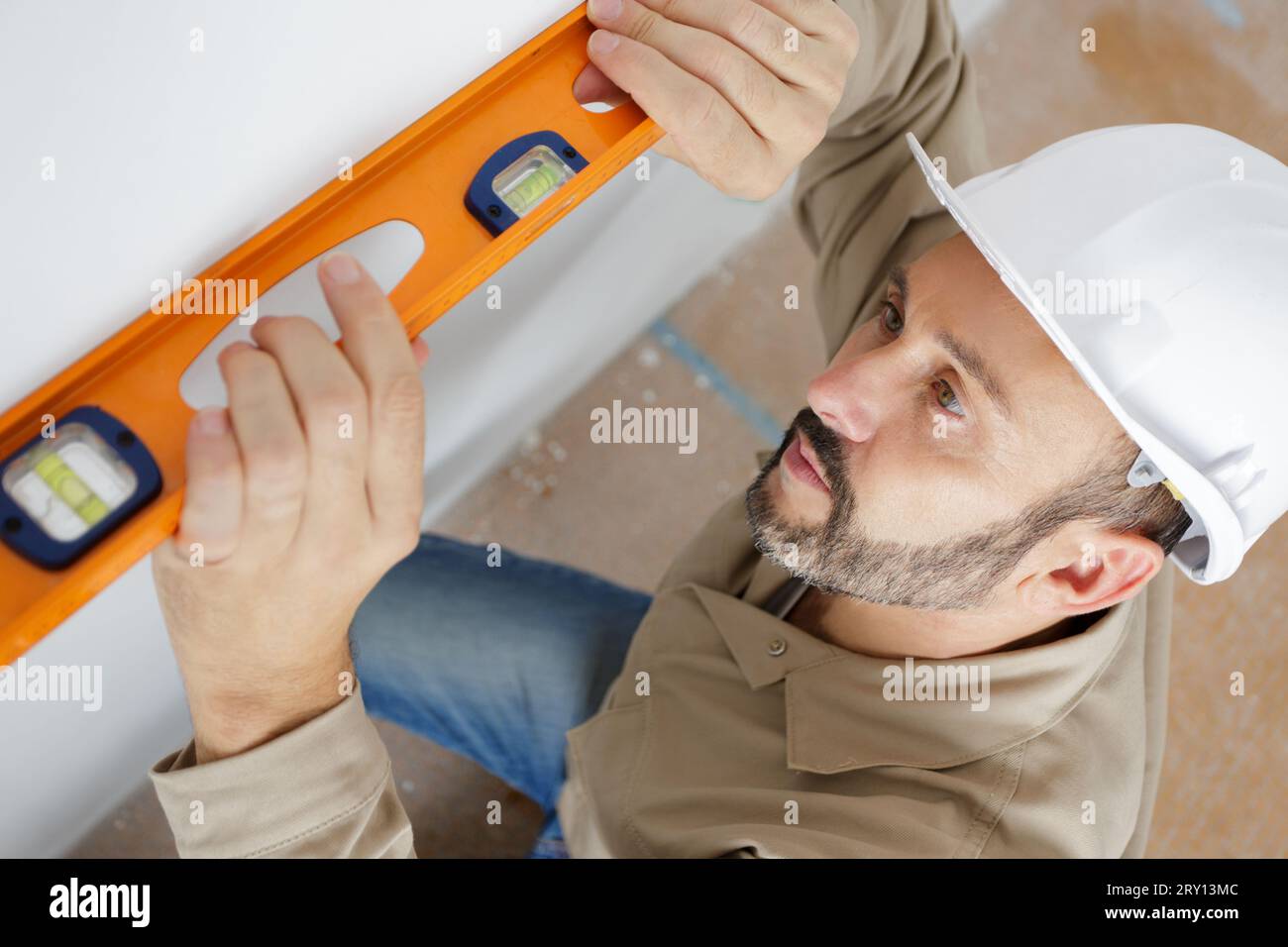 Serious male builder using hi-res stock photography and images - Alamy