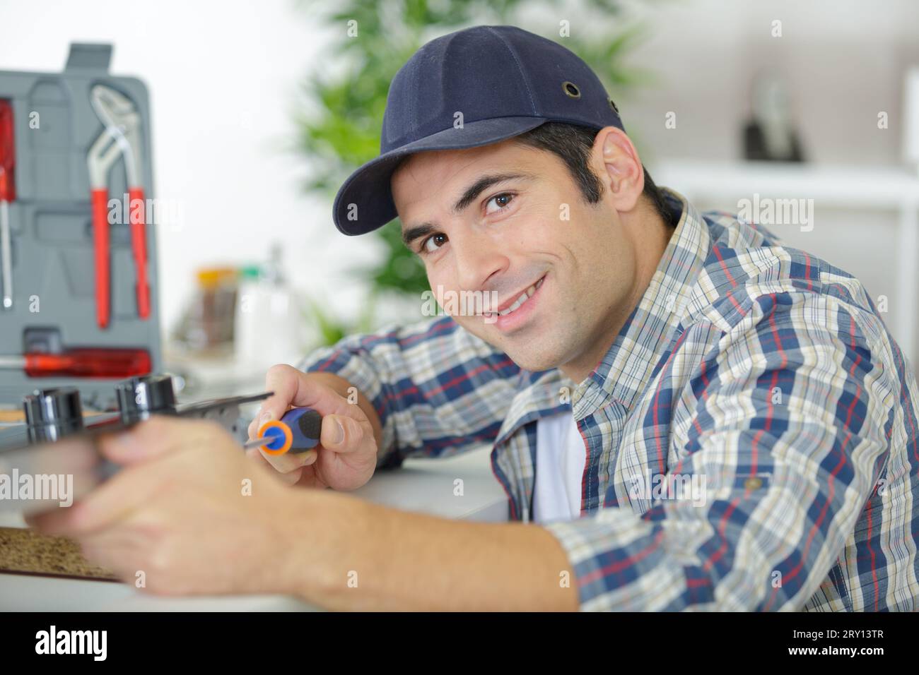 happy man with with tools Stock Photo - Alamy