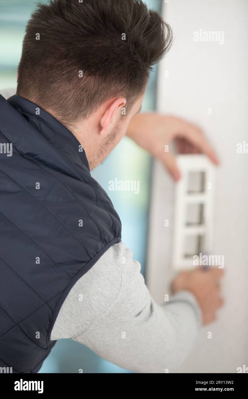 Installing electrical outlets hi-res stock photography and images - Alamy