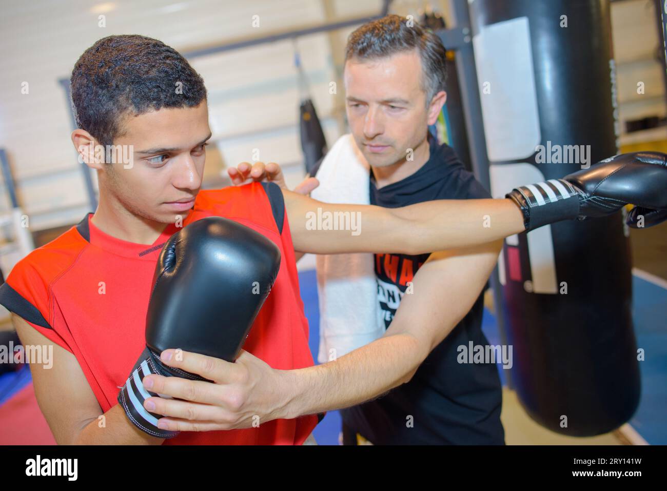 coach and man in boxing class Stock Photo - Alamy