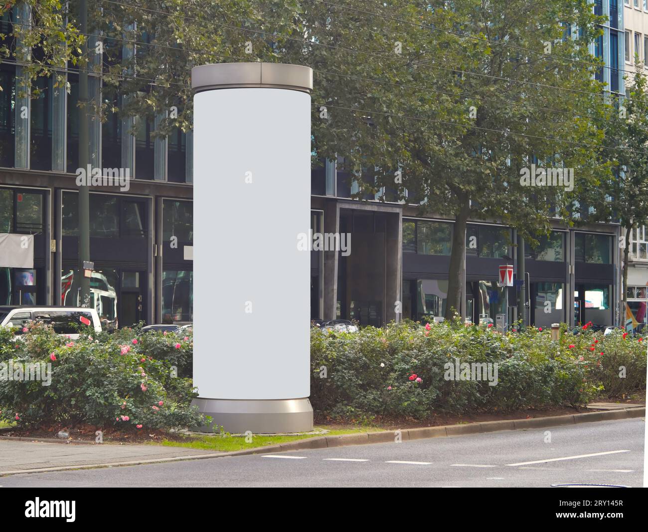 Empty advertising pillar in a city with grey free copy space, promotion ...