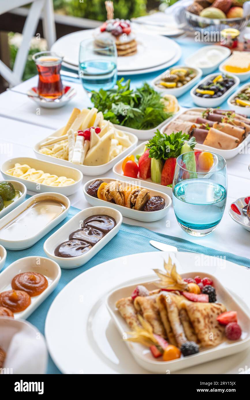 Traditional Turkish Breakfast served with traditional turkish tea on ...