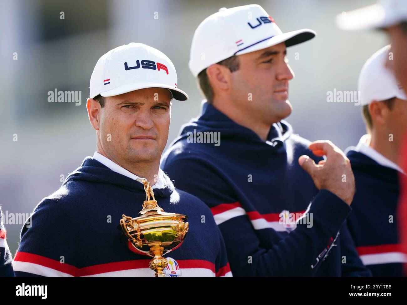 USA Captain Zach Johnson holds the Ryder Cup Trophy during a team group ...